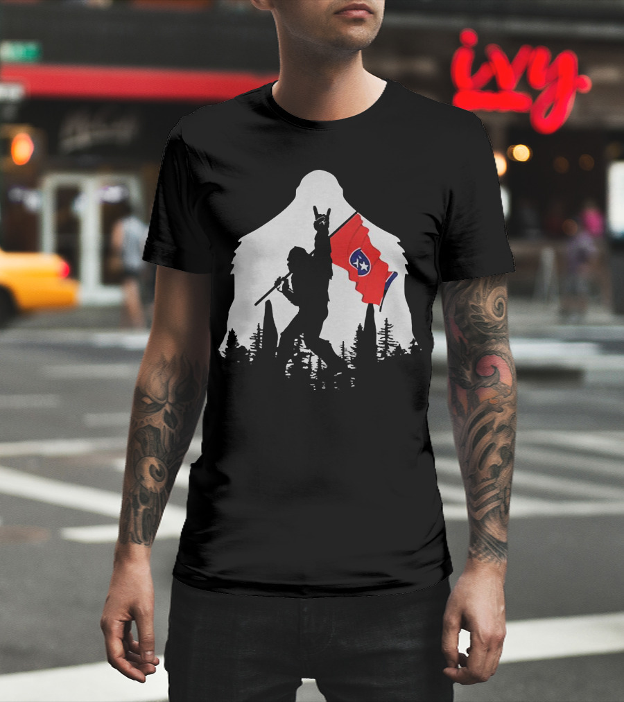 Bigfoot Silhouette With Rock And Roll Pose Holding Tennessee Flag In Forest T-Shirt