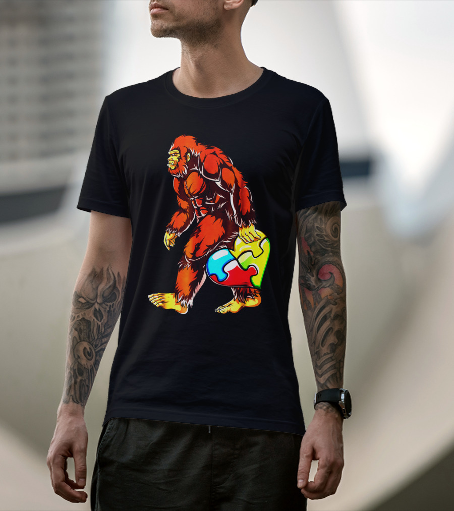 Bigfoot Holding Heart-Shaped Puzzle Piece For Autism Awareness T-Shirt