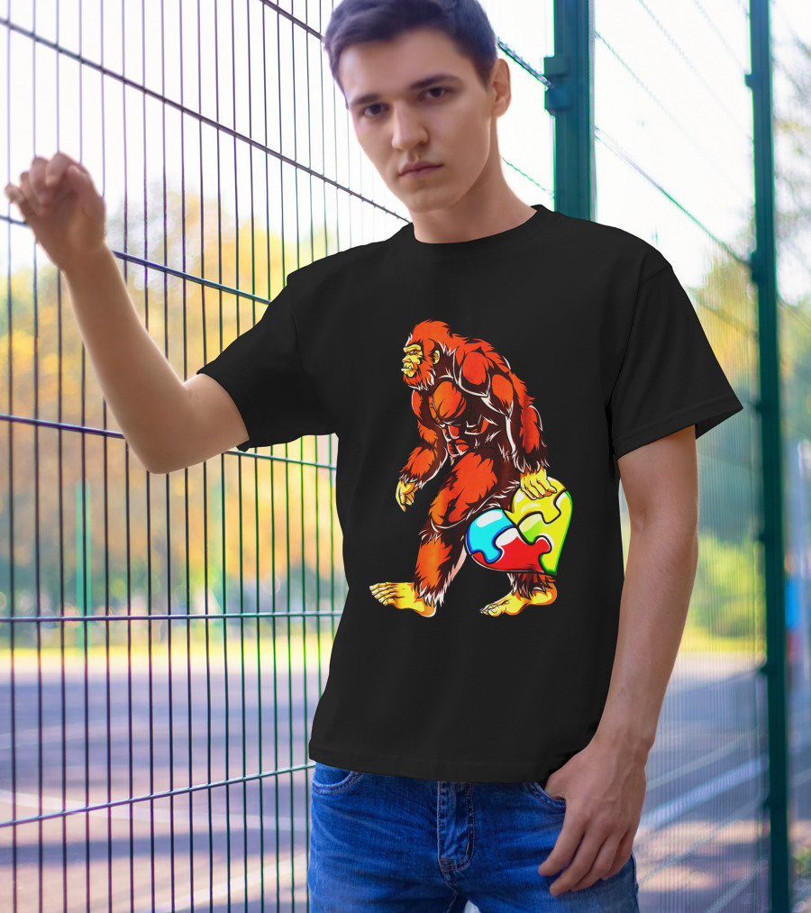 Bigfoot Holding Heart-Shaped Puzzle Piece For Autism Awareness T-Shirt