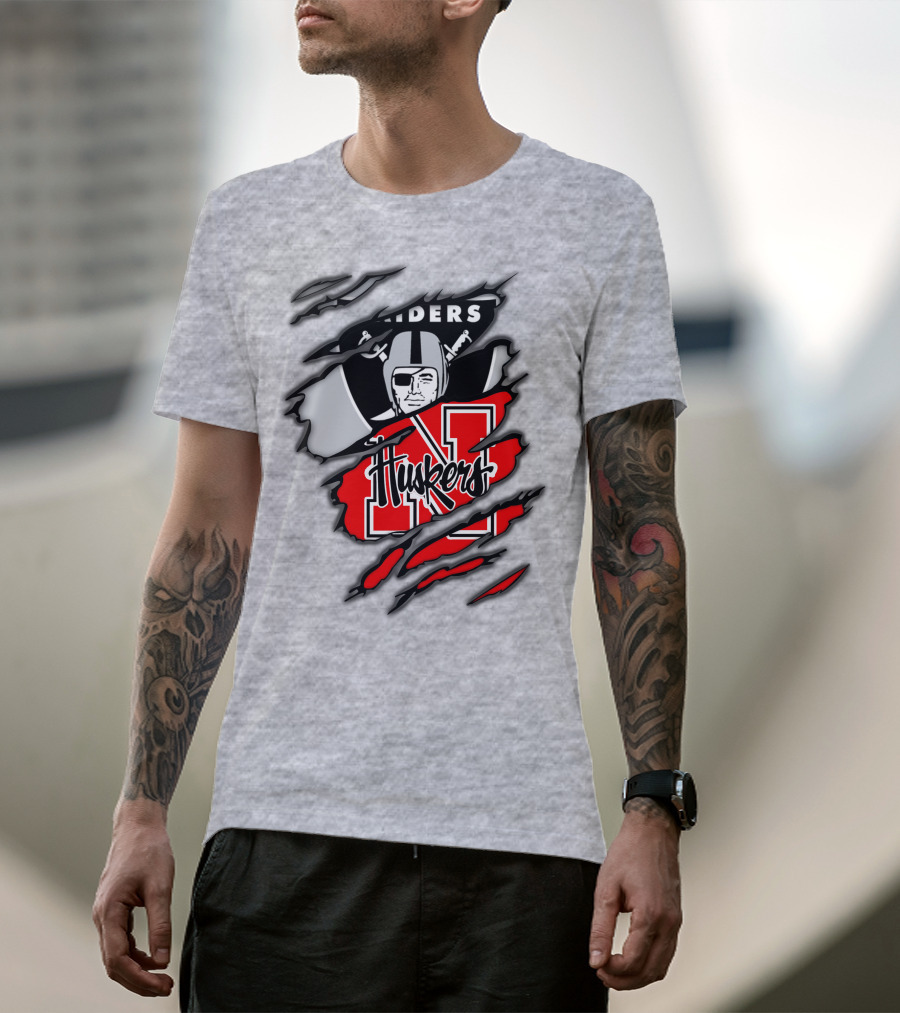 Raiders Huskers Torn Design With Icons And Symbols T-Shirt