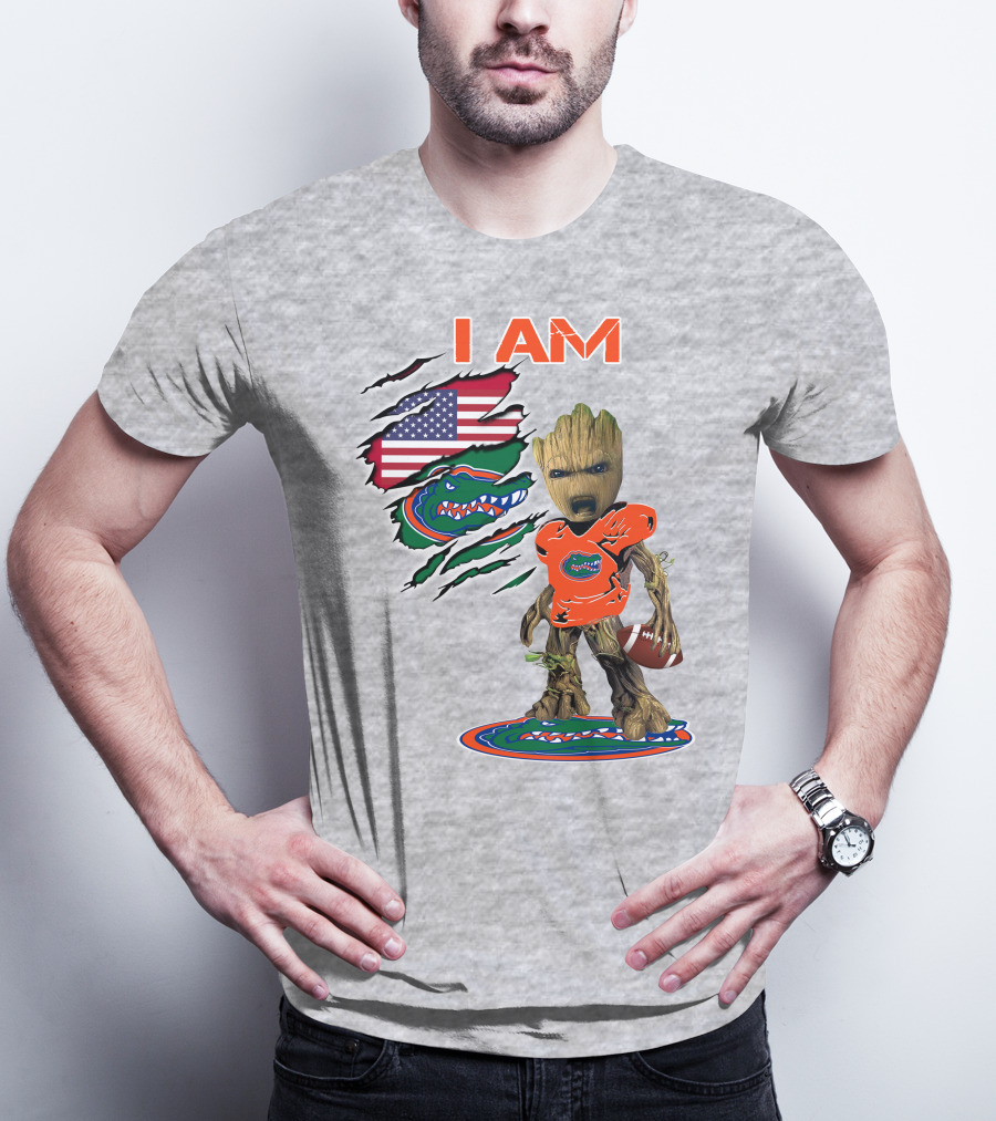 I Am Gators Baby Groot Holding Football With American Flag And Florida Gators T-Shirt