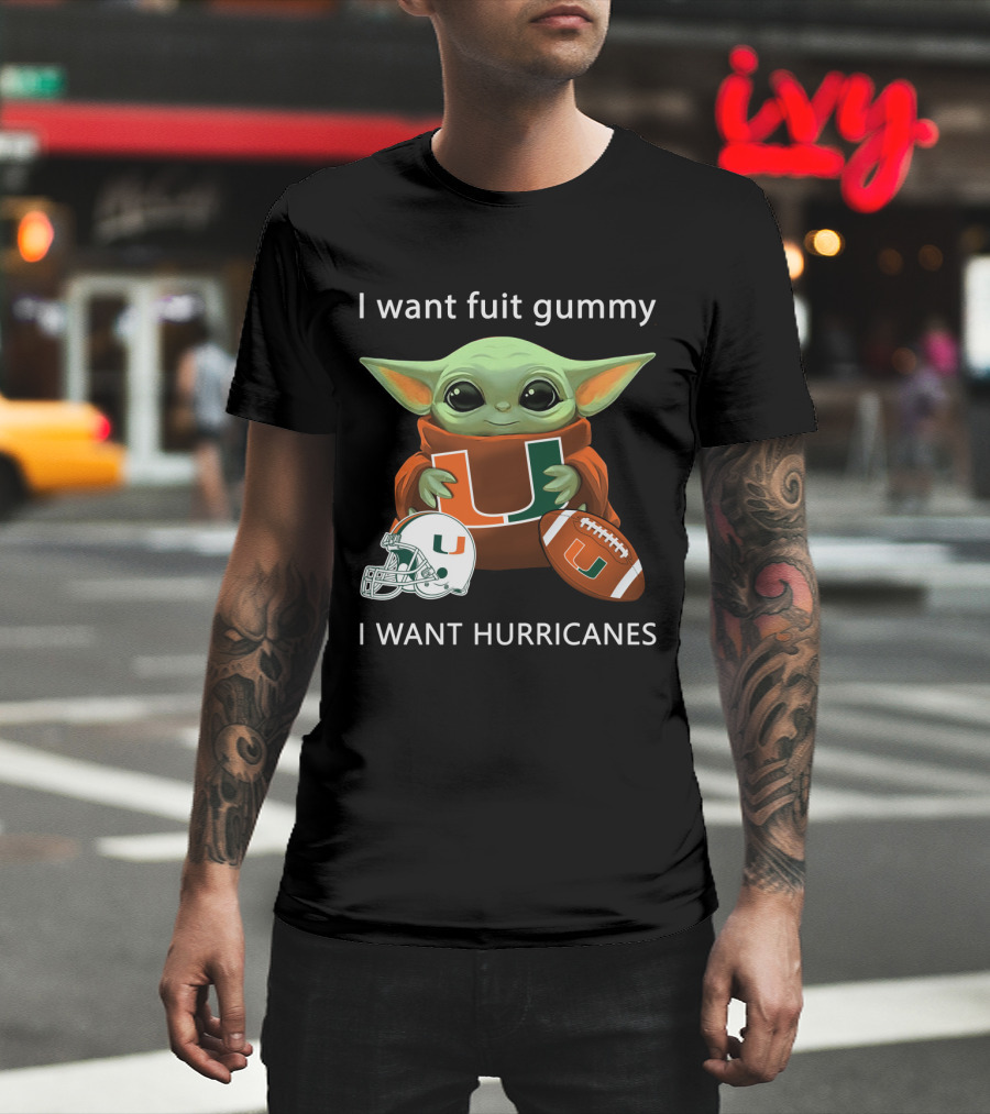 I Want Fuit Gummy I Want Hurricanes Baby Yoda Holding Miami Hurricanes Logo Helmet And Football T-Shirt