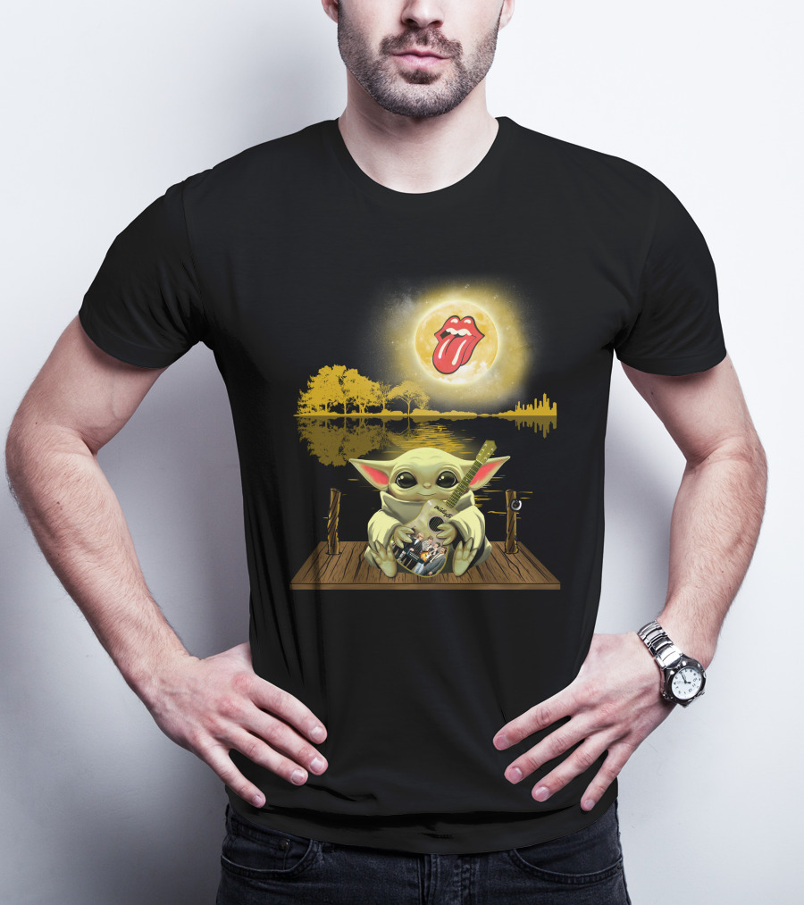 The Rolling Stones Tongue Logo And Baby Yoda With Guitar Under Moonlit Sky Trees And Lake Reflection T-Shirt