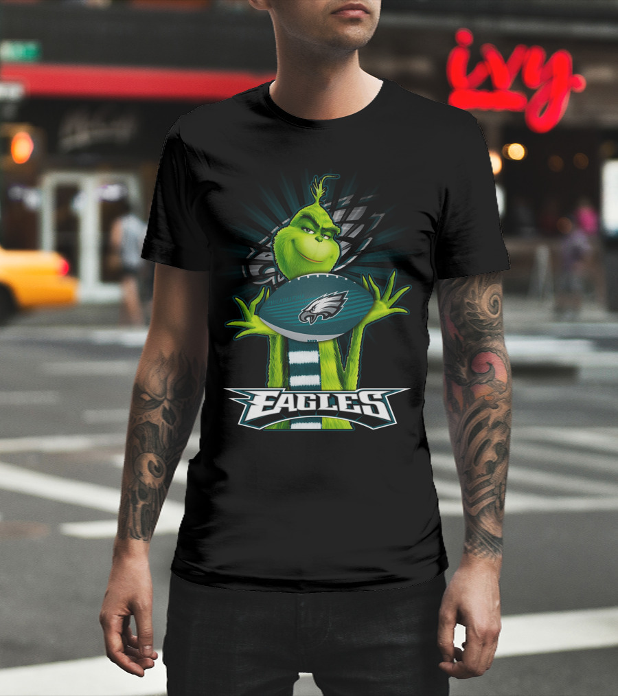 Grinch Holding Philadelphia Eagles Football With Team T-Shirt