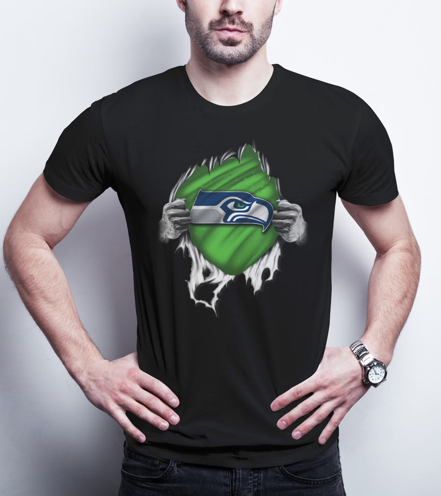 Torn Seattle Seahawks Logo With Green Background And Hands Peeling Fabric T-Shirt