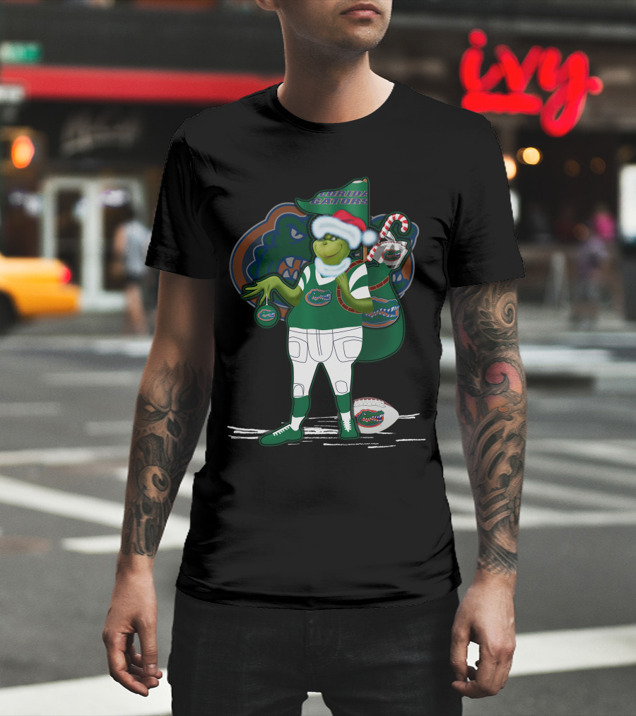 Grinchxmas Wearing Santa Hat Florida Gators With Gator Logo And Candy Cane T-Shirt