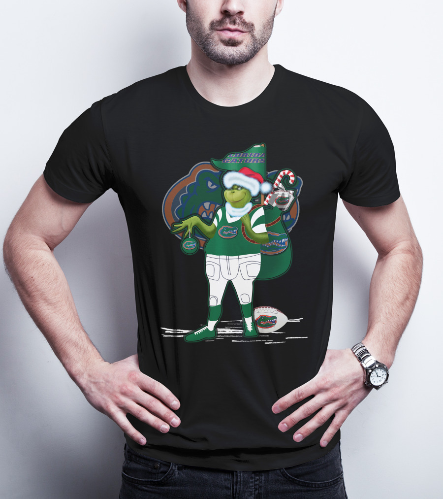 Grinchxmas Wearing Santa Hat Florida Gators With Gator Logo And Candy Cane T-Shirt
