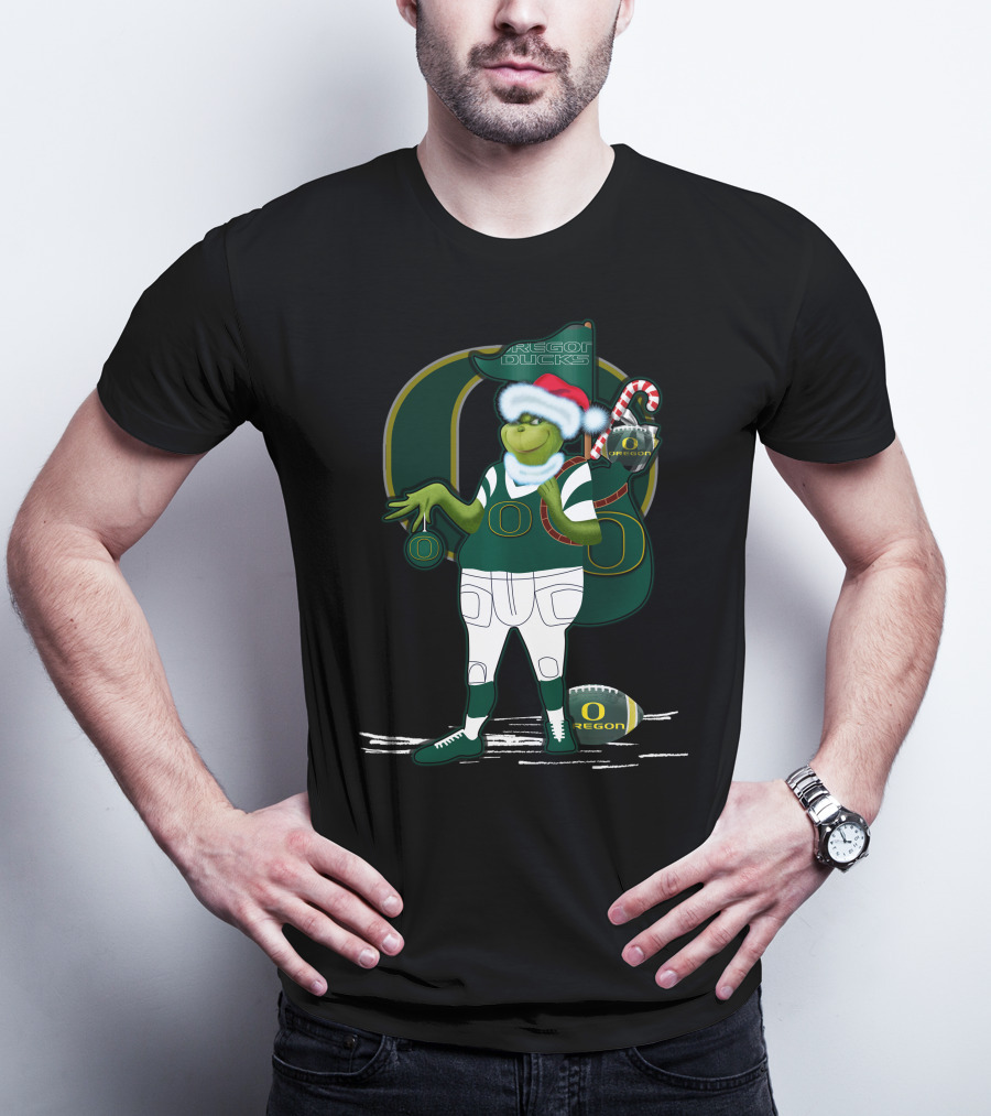 Oregon Ducks Grinch Santa With Candy Cane And Football T-Shirt