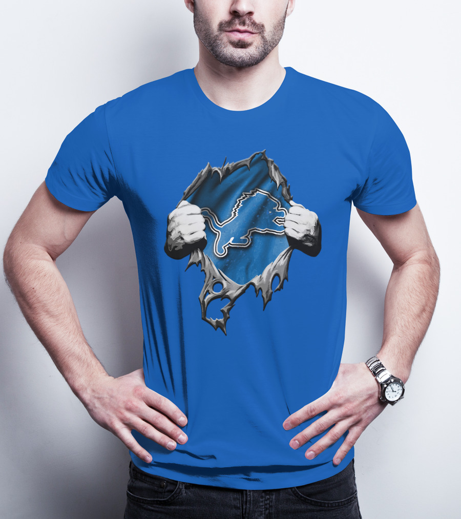 Torn Skin Revealing Detroit Lions Emblem On Blue T-Shirt