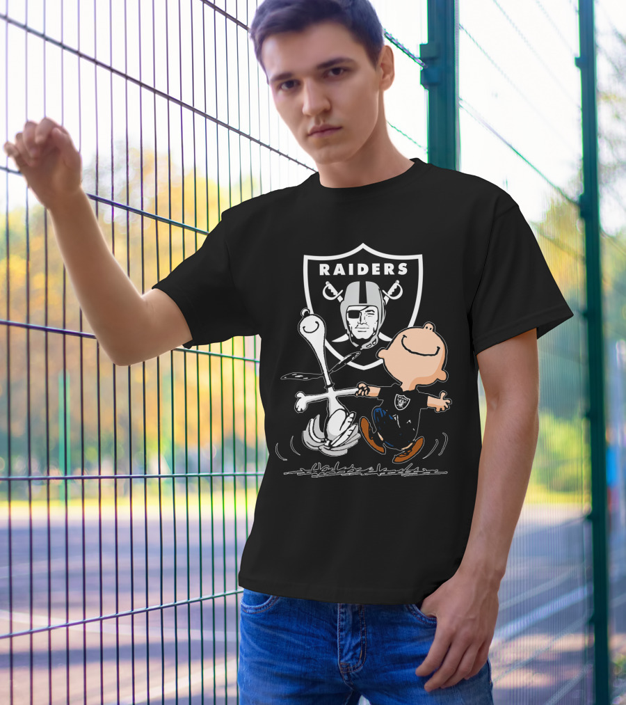 Snoopy And Charlie Brown Dancing In Front Of Oakland Raiders T-Shirt
