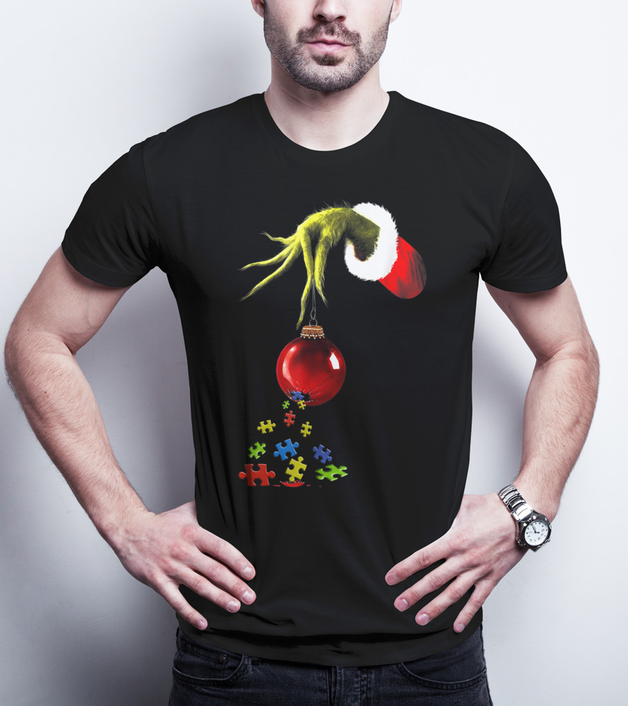 Grinch Hand Holding Red Ornament With Autism Puzzle Pieces T-Shirt