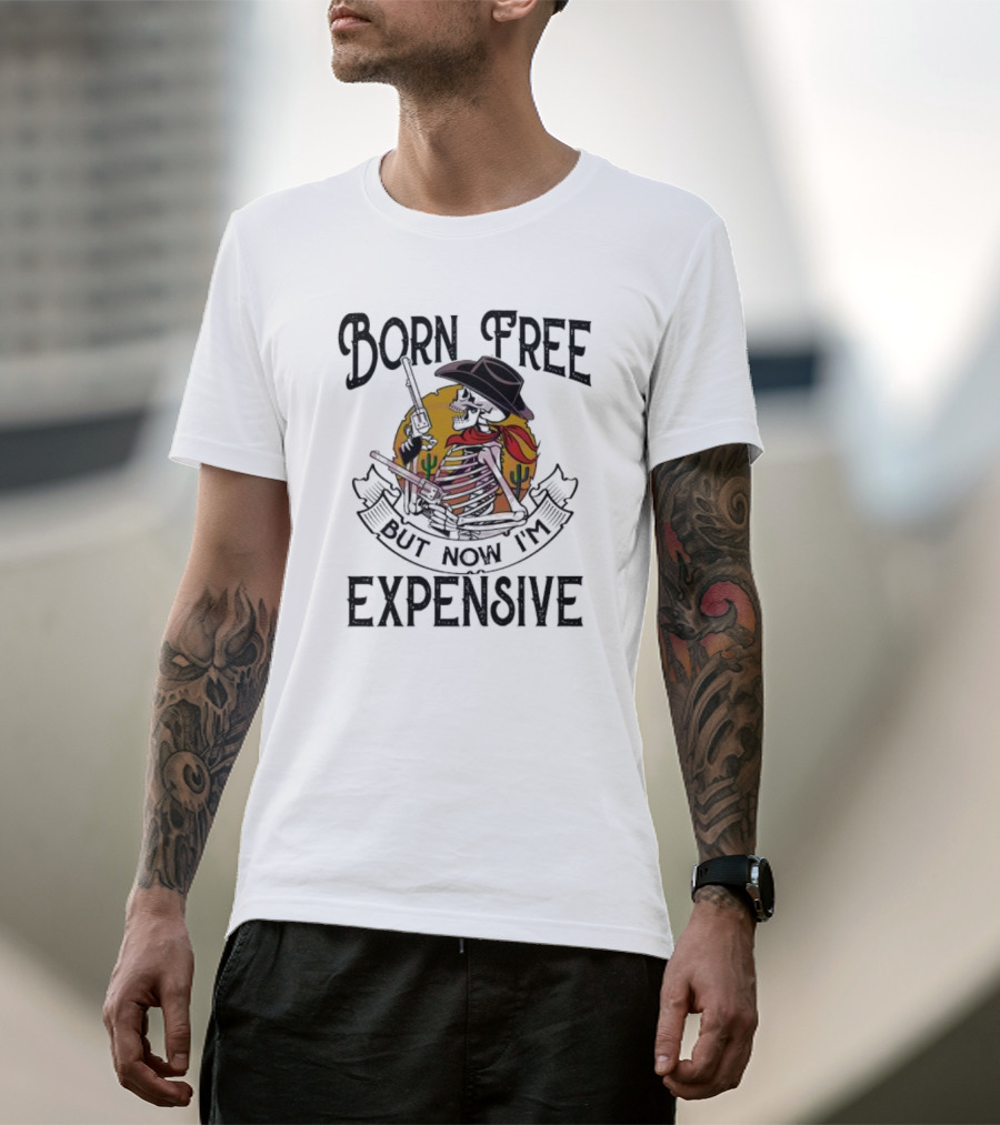 Skeleton Cowboy Born Free But Now I'm Expensive With Gun And Cactus Background T-Shirt