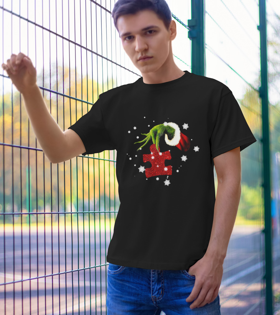 Grinch Hand Holding Red Glitter Puzzle Piece Autism Christmas Snowflakes T-Shirt