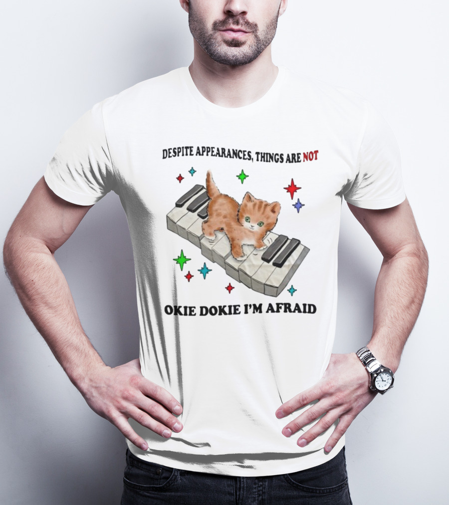 Despite Appearances Things Are Not Okie Dokie I'm Afraid Cat On Piano Keys With Colorful Stars T-Shirt