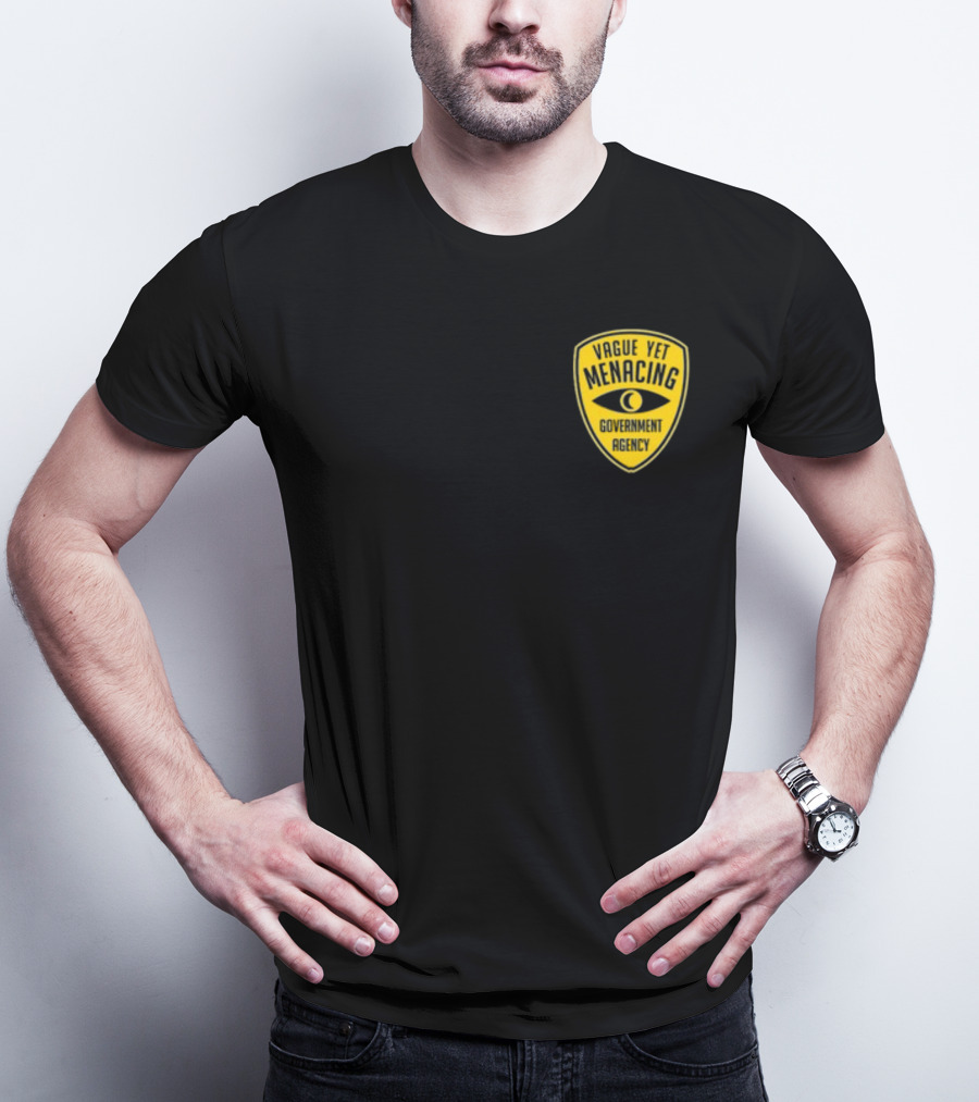 Vague Yet Menacing Government Agency Yellow Badge With Eye T-Shirt