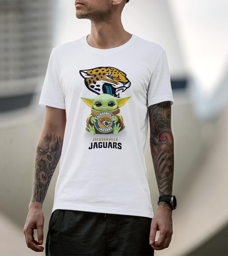 Grogu Holding Jacksonville Jaguars Badge With Mascot In Background T-Shirt