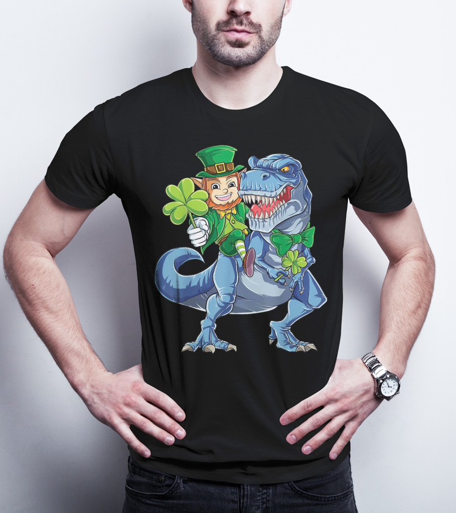 Leprechaun With Shamrock And Bowtie Riding T-Rex Dinosaur T-Shirt