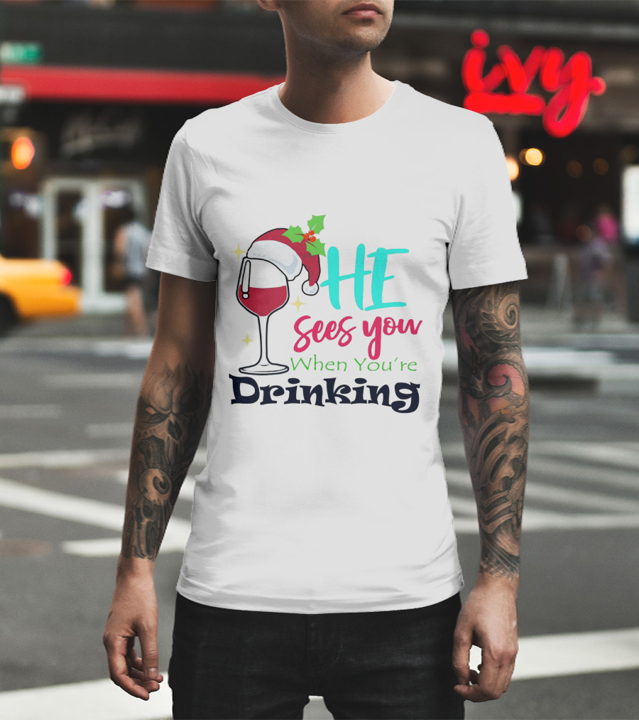 Santa Hat On Wine Glass With 'He Sees You When You're Drinking' Christmas Festive T-Shirt