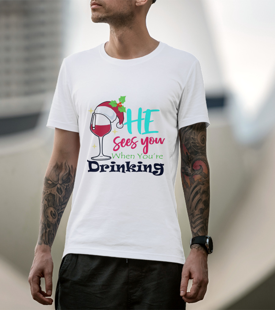 Santa Hat On Wine Glass With 'He Sees You When You're Drinking' Christmas Festive T-Shirt