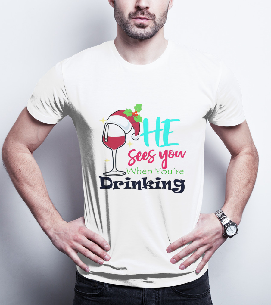 Santa Hat On Wine Glass With 'He Sees You When You're Drinking' Christmas Festive T-Shirt