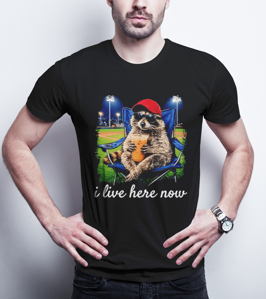 Raccoon I Live Here Now With Sunglasses And Drink At Baseball Field T-Shirt