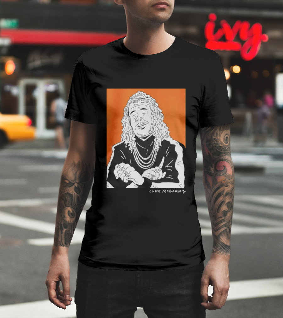 Luke McGarry Cartoon Character With Long Hair And Chains On Orange T-Shirt