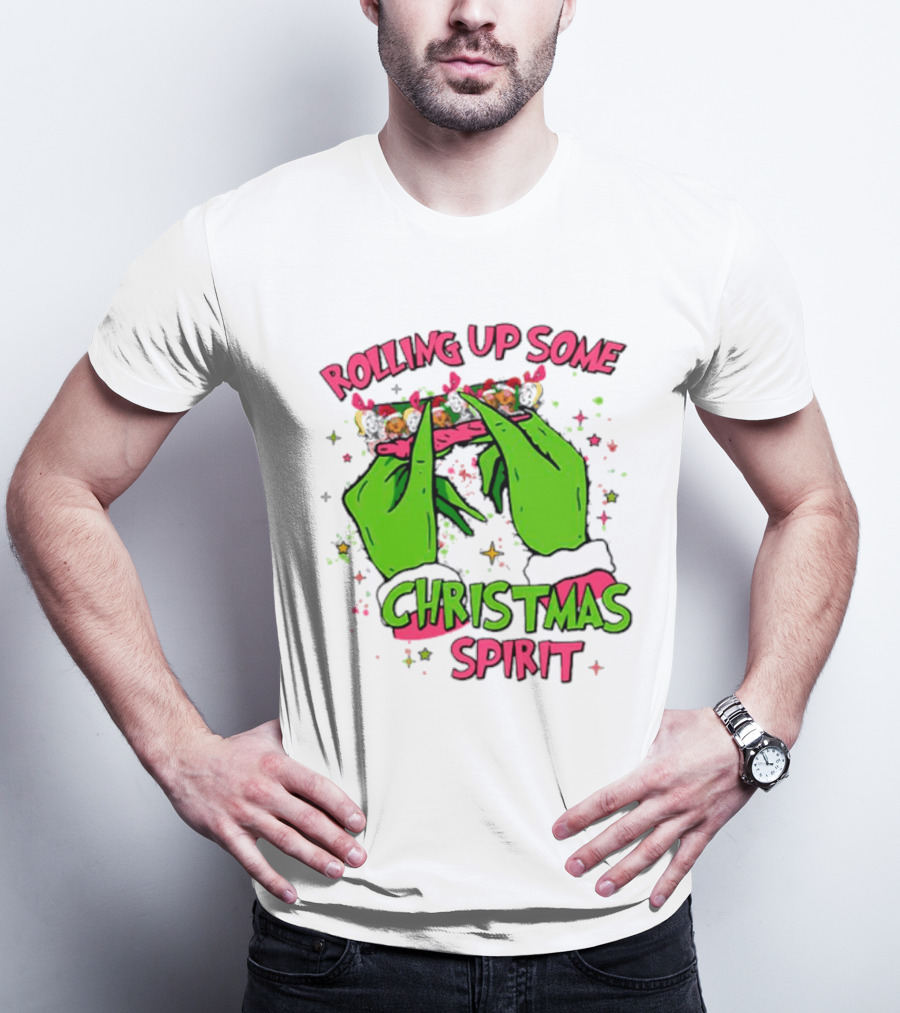 Grinch Rolling Up Some Christmas Spirit With Green Hands And Glitter Stars T-Shirt