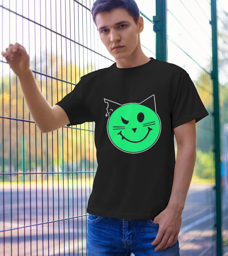 Taliesin Wearing MeowMeowz Smiling Cat Face With Green Circle Black Ears Whiskers T-Shirt