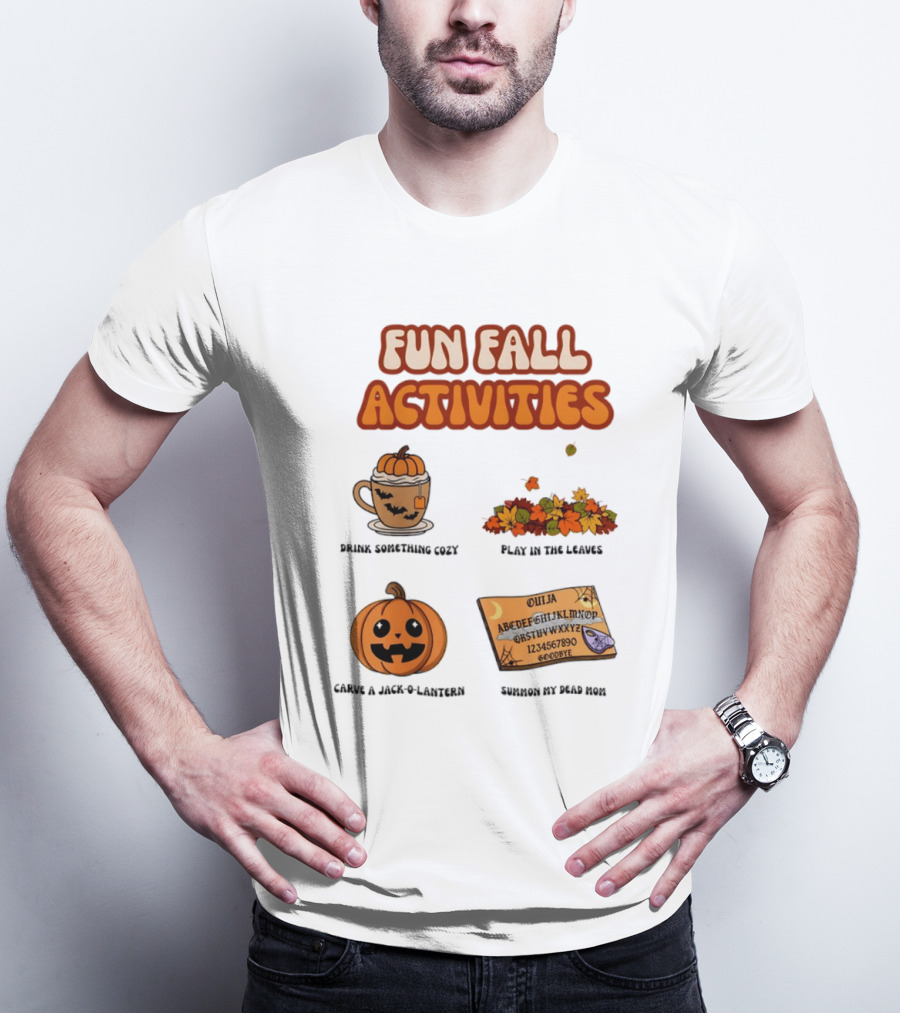 Fun Fall Activities Halloween Drink Something Cozy Ouija Board Carve A Jack O Lantern Play In The Leaves T-Shirt