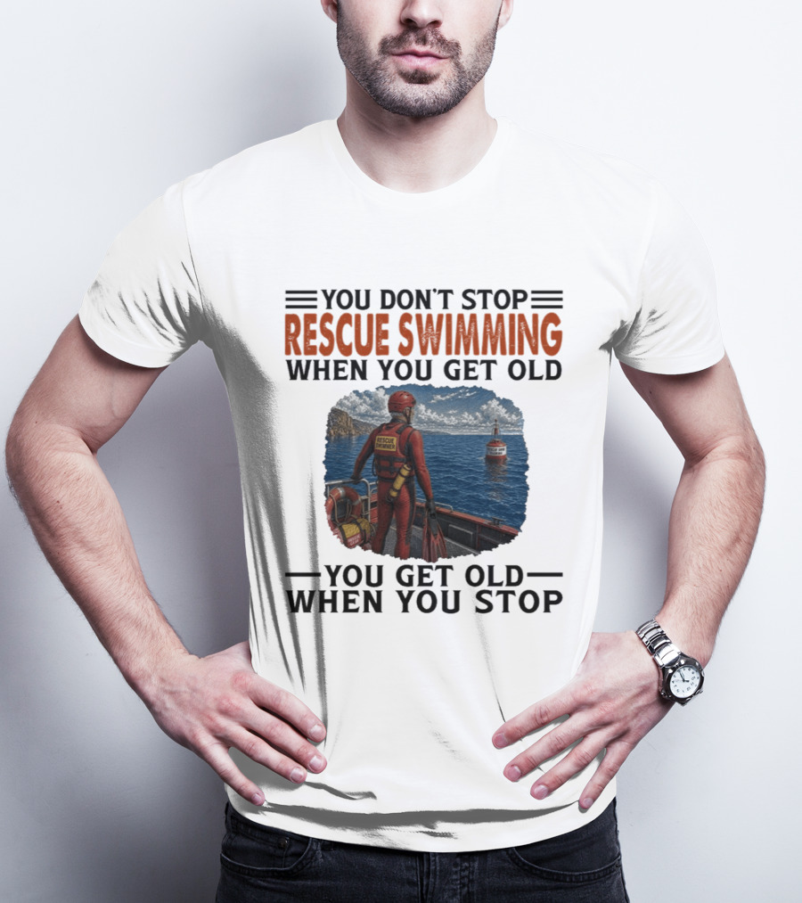 You Don't Stop Rescue Swimming When You Get Old You Get Old When You Stop Rescue Swimmer Standing On Boat Near Lighthouse T-Shirt
