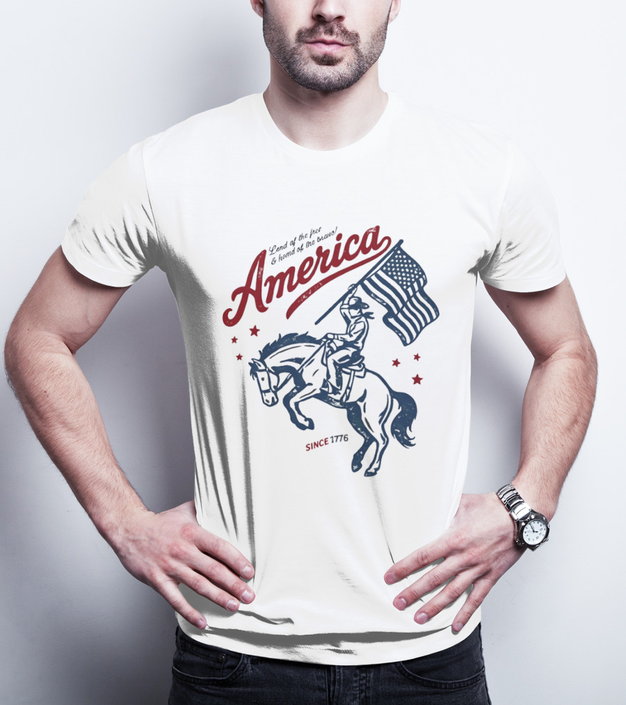 America Land Of The Free Home Of The Brave Since 1776 Cowboy Holding Flag Patriotic T-Shirt