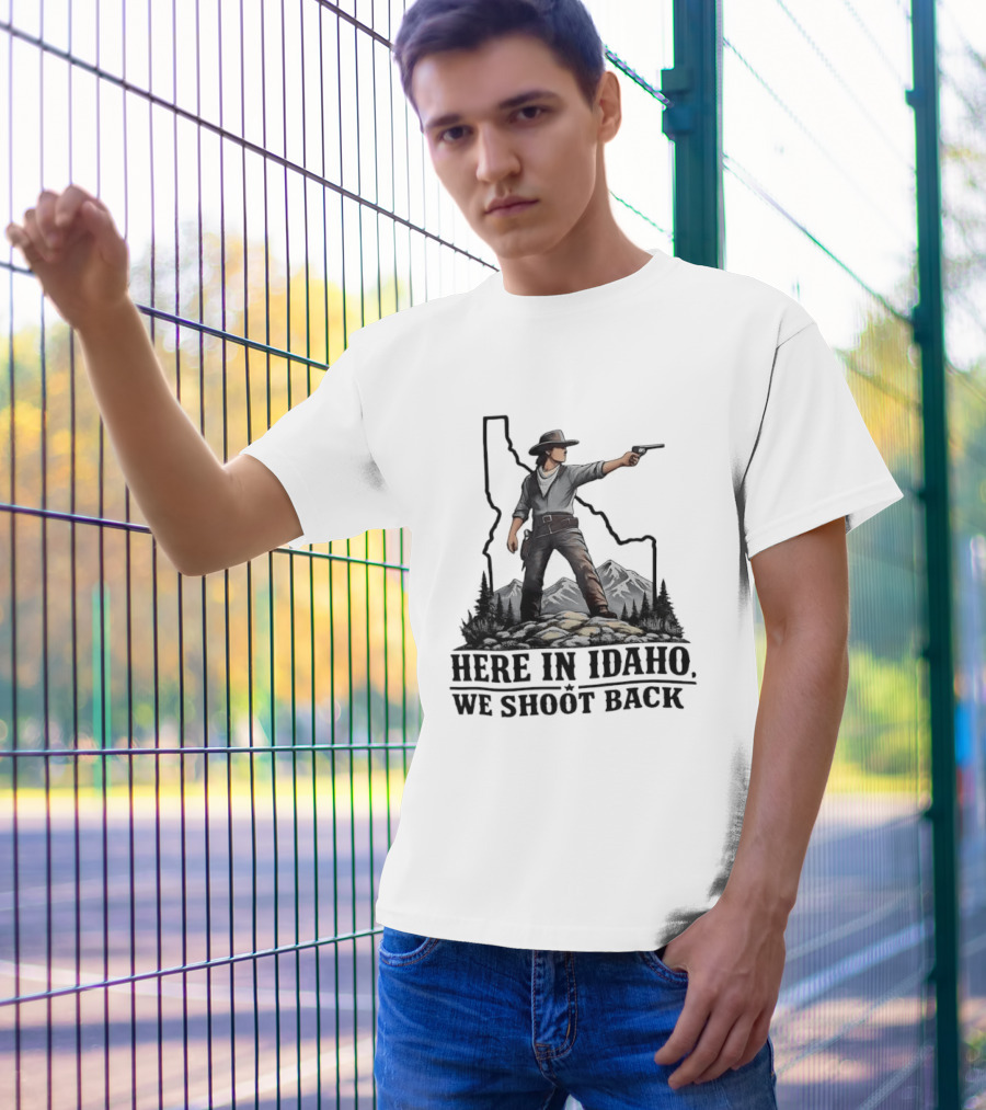 Here In Idaho We Shoot Back Cowboy With Pistol In State Mountains Scene T-Shirt