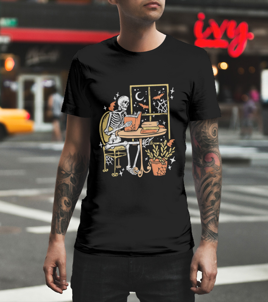 Cartoon Skeleton Reading Under Crescent Moon With Bats Orange Book Table Window T-Shirt