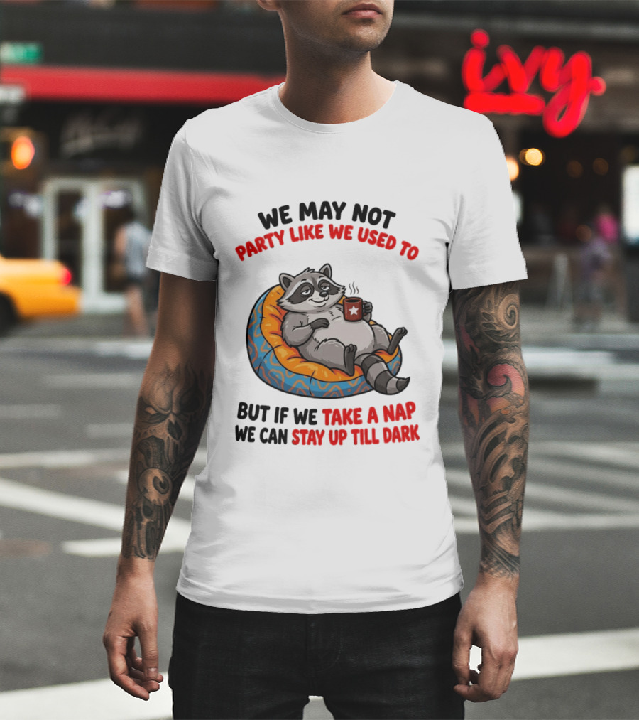 We May Not Party Like We Used To Raccoon With Coffee Relaxing On Bean Bag T-Shirt