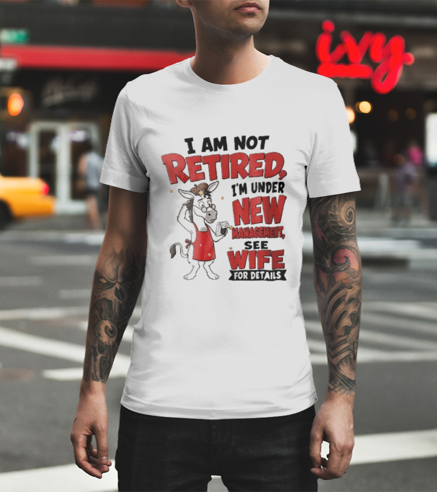 I Am Not Retired I'm Under New Management See Wife For Details Cartoon Donkey Red Apron T-Shirt