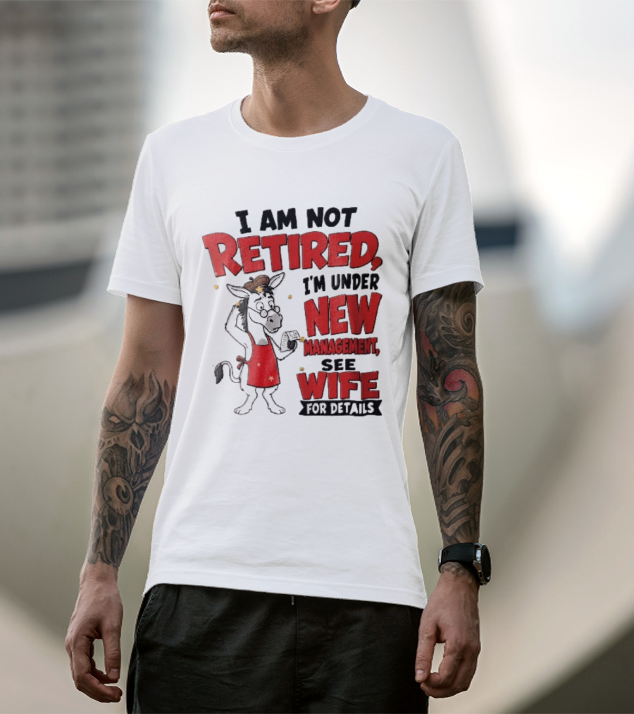 I Am Not Retired I'm Under New Management See Wife For Details Cartoon Donkey Red Apron T-Shirt