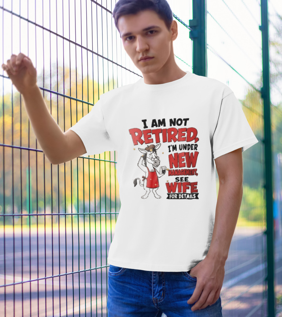 I Am Not Retired I'm Under New Management See Wife For Details Cartoon Donkey Red Apron T-Shirt