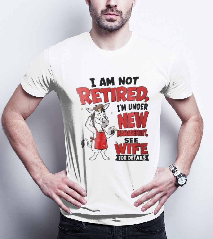 I Am Not Retired I'm Under New Management See Wife For Details Cartoon Donkey Red Apron T-Shirt