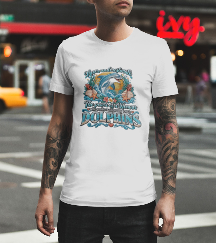 Never Underestimate The Power Of A Woman Who Really Loves Dolphins Ocean Waves Sunburst Shells T-Shirt