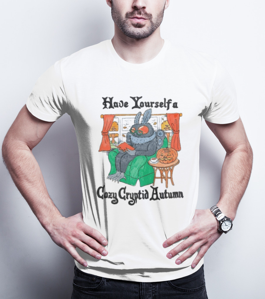 Have Yourself A Cozy Cryptid Autumn Mothman Reading By Pumpkin Window Scene T-Shirt