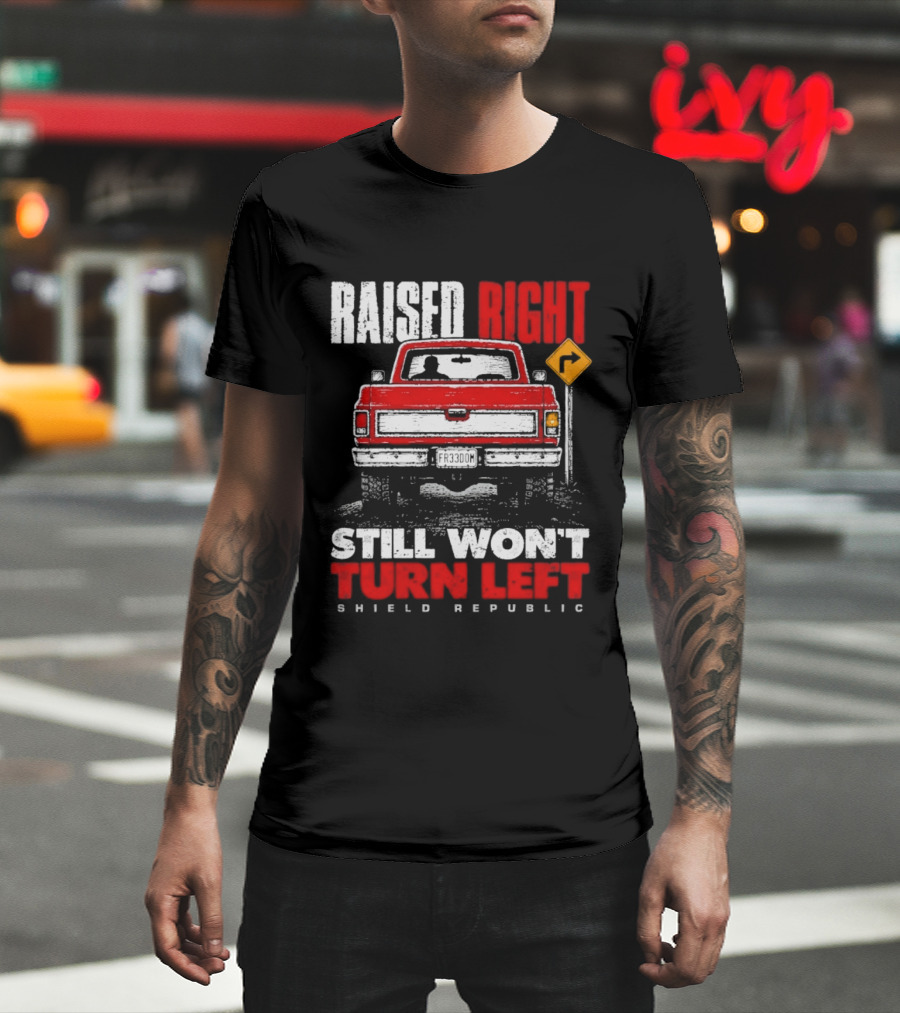 Raised Right Still Won't Turn Left Shield Republic Truck Back View With Right Turn Sign T-Shirt