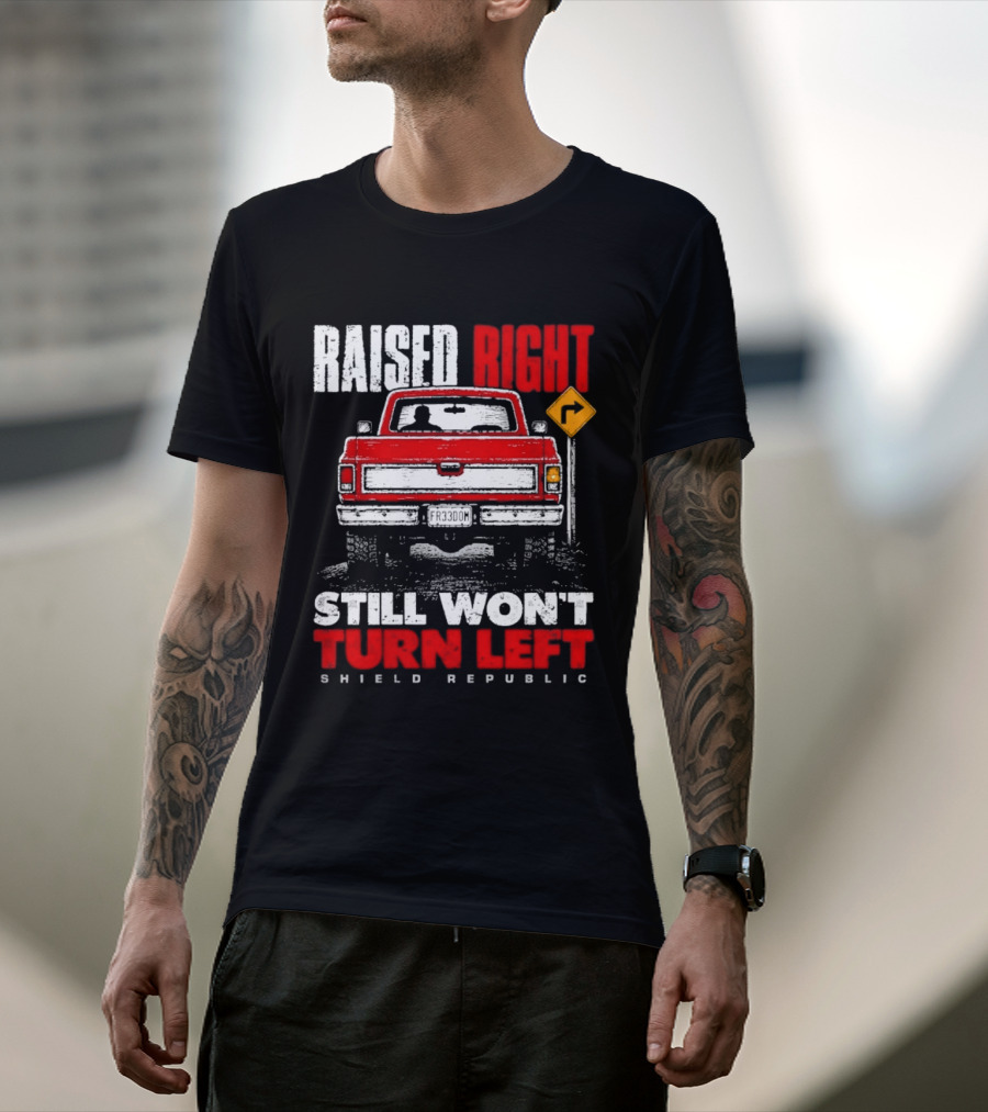 Raised Right Still Won't Turn Left Shield Republic Truck Back View With Right Turn Sign T-Shirt