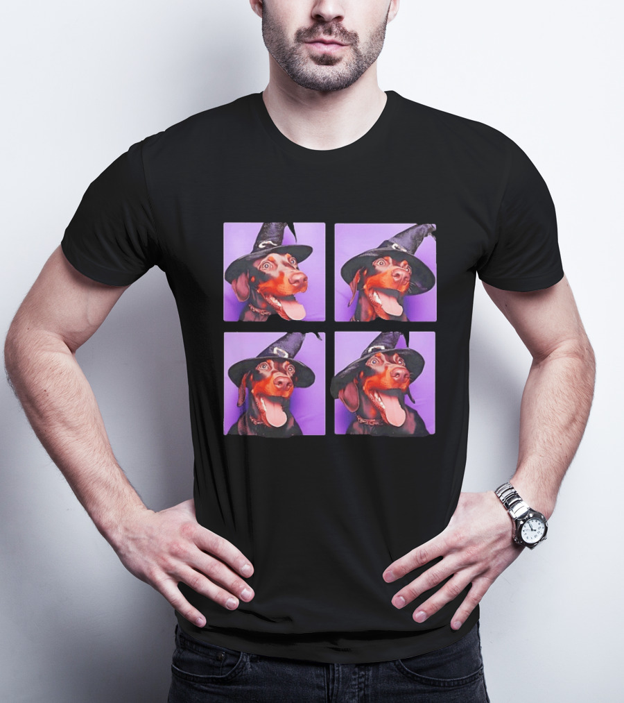 Doberman Pinscher In Witch Hat For Halloween With Purple T-Shirt