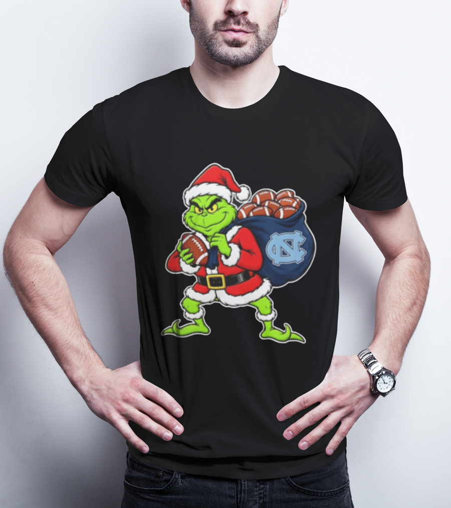 Grinch Santa North Carolina Tar Heels Holding Chiefs Footballs Christmas T-Shirt