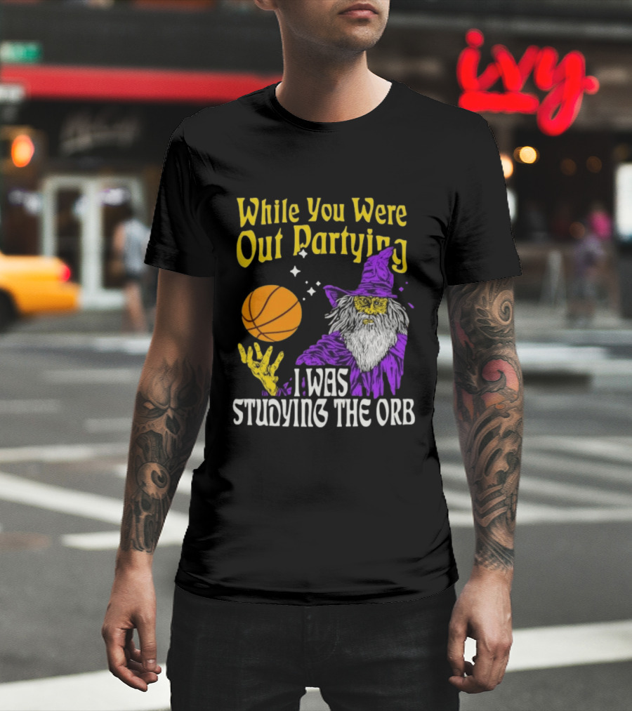 While You Were Out Partying I Was Studying The Orb Wizard Basketball T-Shirt