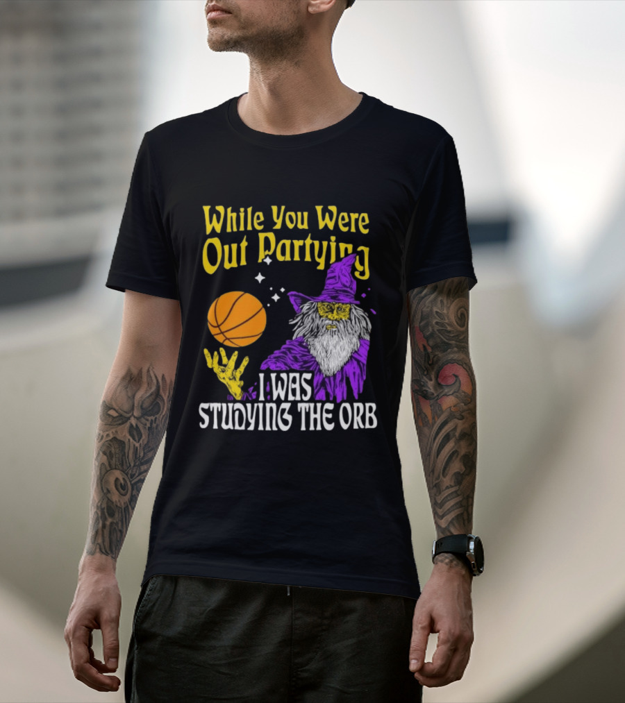 While You Were Out Partying I Was Studying The Orb Wizard Basketball T-Shirt