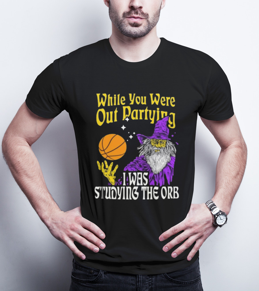 While You Were Out Partying I Was Studying The Orb Wizard Basketball T-Shirt