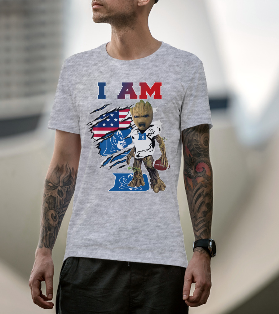 I AM Duke Baby Groot With American Football And Flag Background T-Shirt