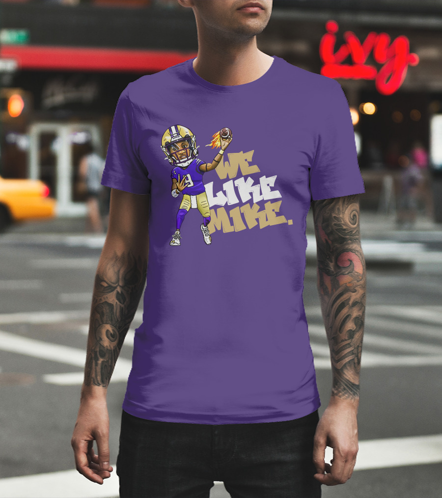 We Like Mike Football Character In Purple And Gold Gear Holding Flaming Ball T-Shirt