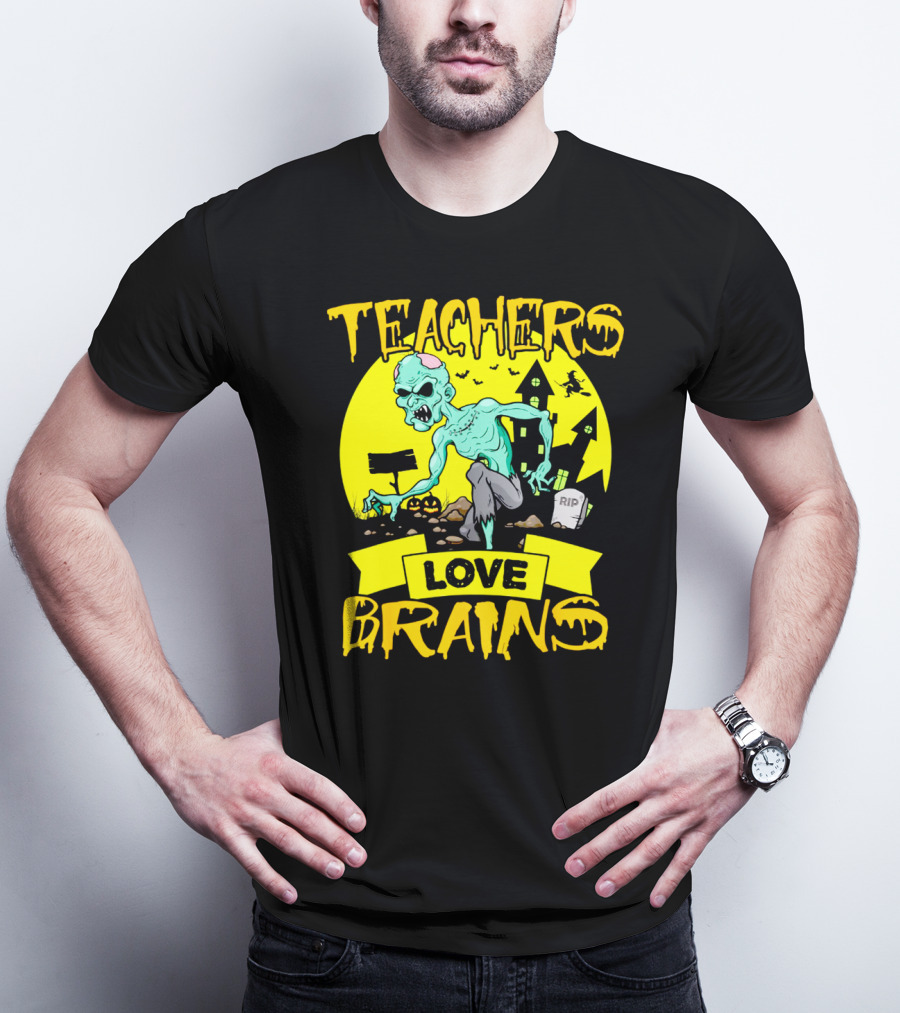 Teachers Love Brains Zombie Halloween Theme With Haunted Houses And Graveyard Background T-Shirt